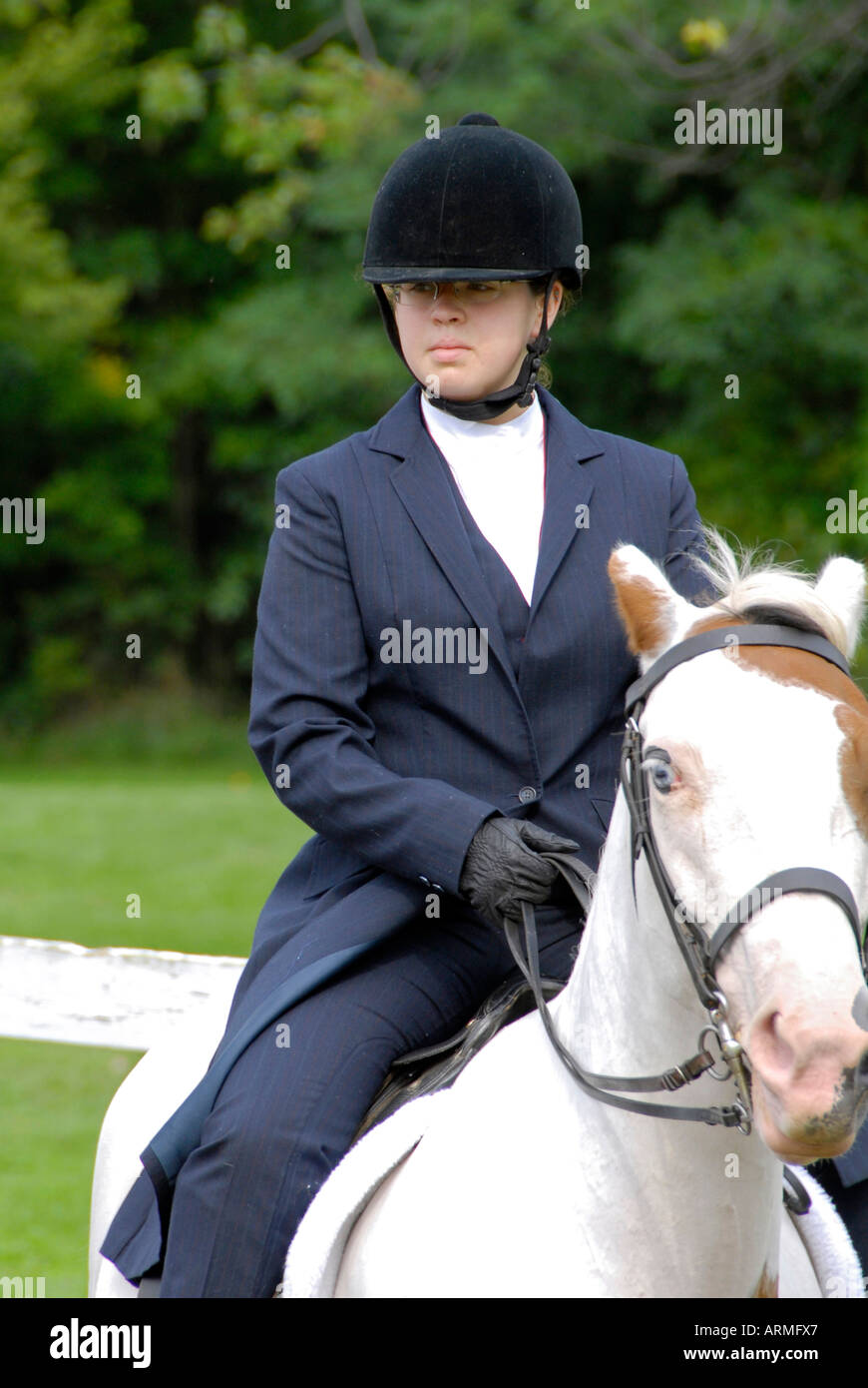 High school female student competes in equestrian event Stock Photo - Alamy