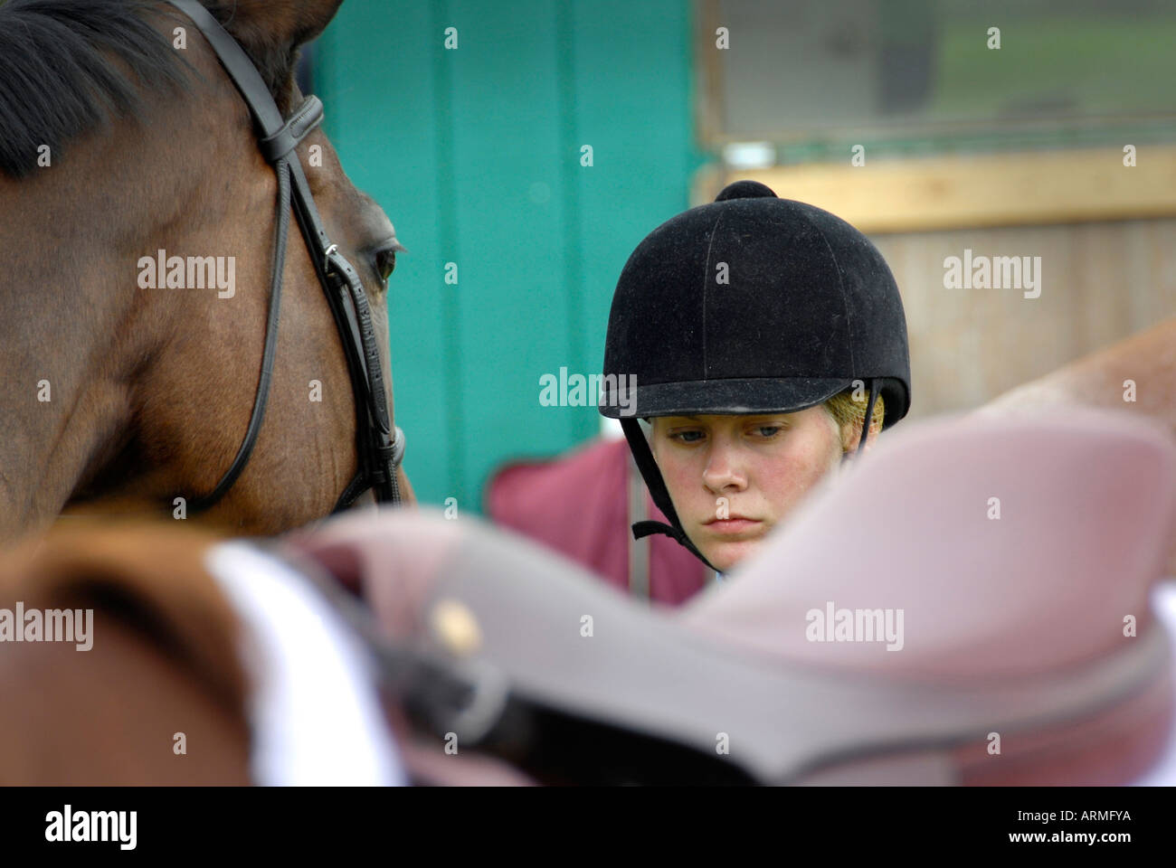 Portrait girl in equestrian clothing hi-res stock photography and ...
