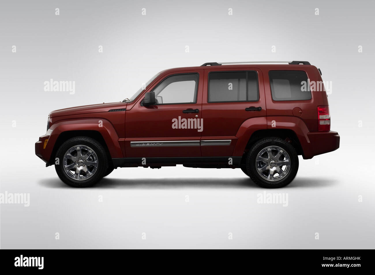 2008 Jeep Liberty Limited in Red - Drivers Side Profile Stock Photo - Alamy