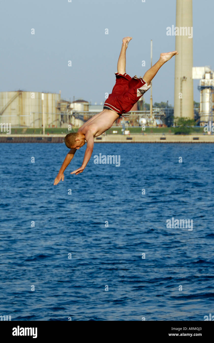 A boy dives off hi-res stock photography and images - Alamy