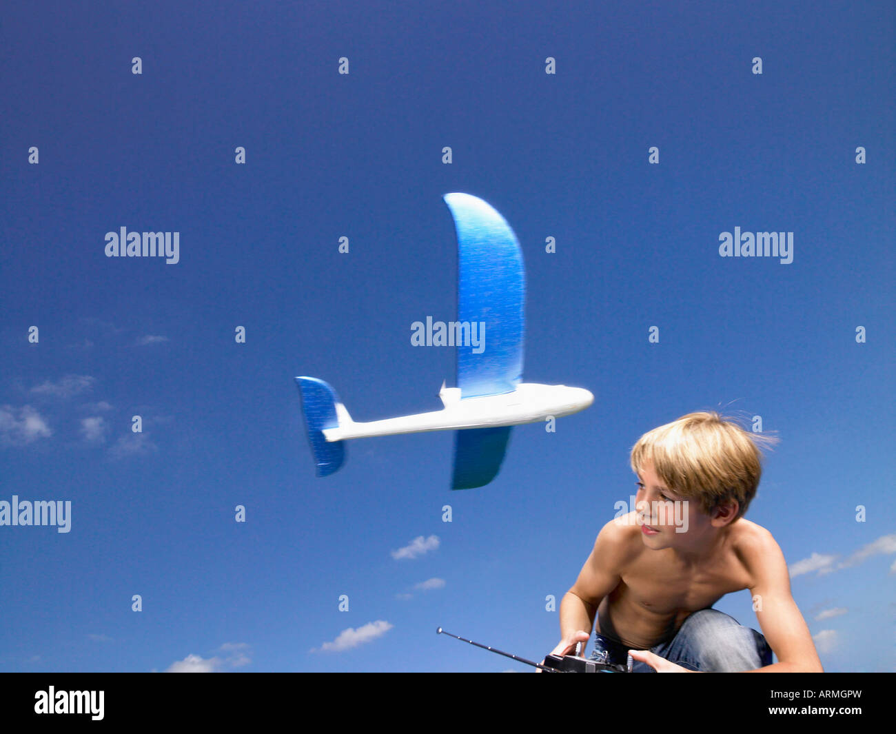 Young boy with remote-control Stock Photo - Alamy