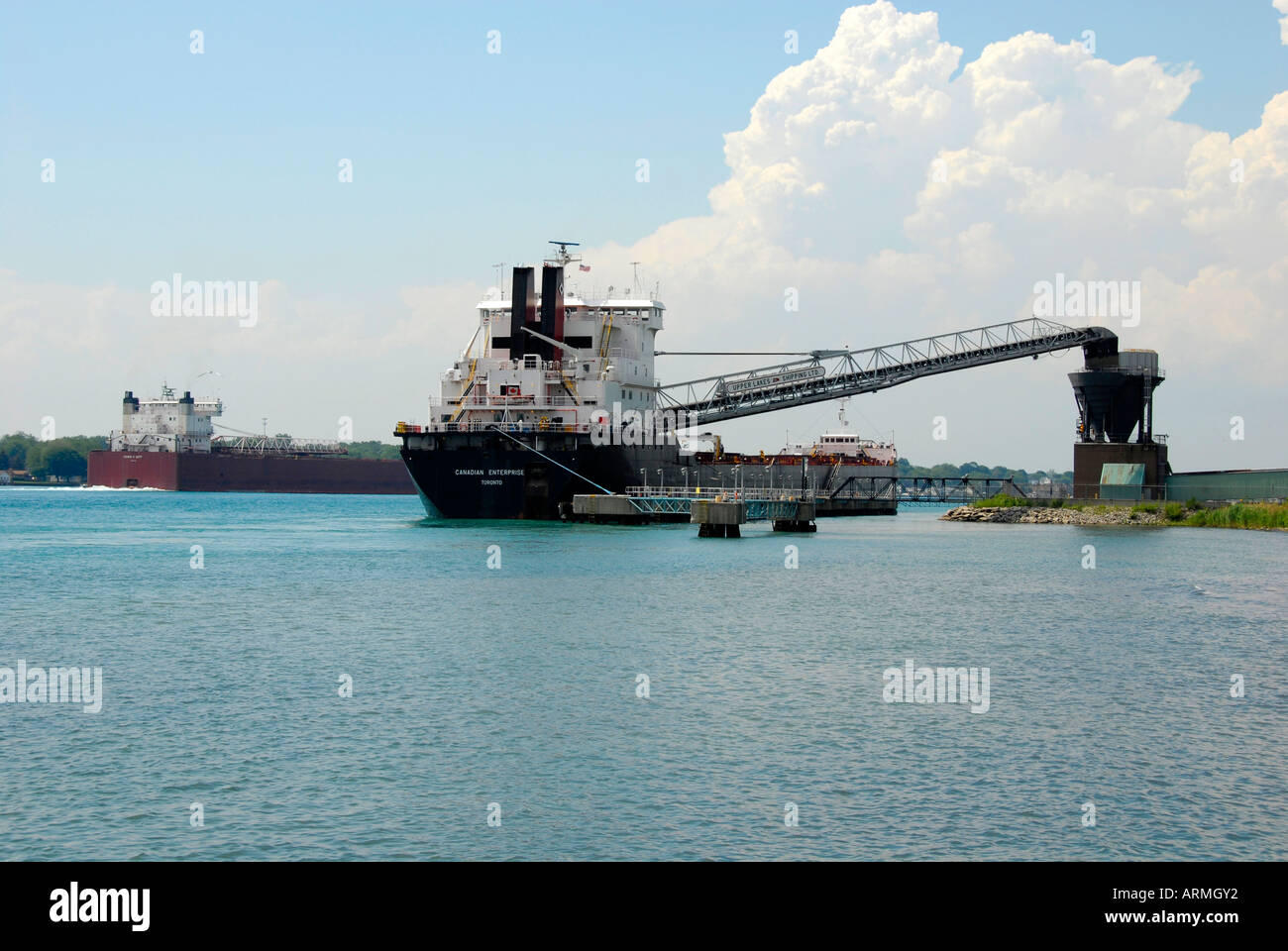 Lake freighter off loads aggregate stone at Port Huron Michigan Stock ...