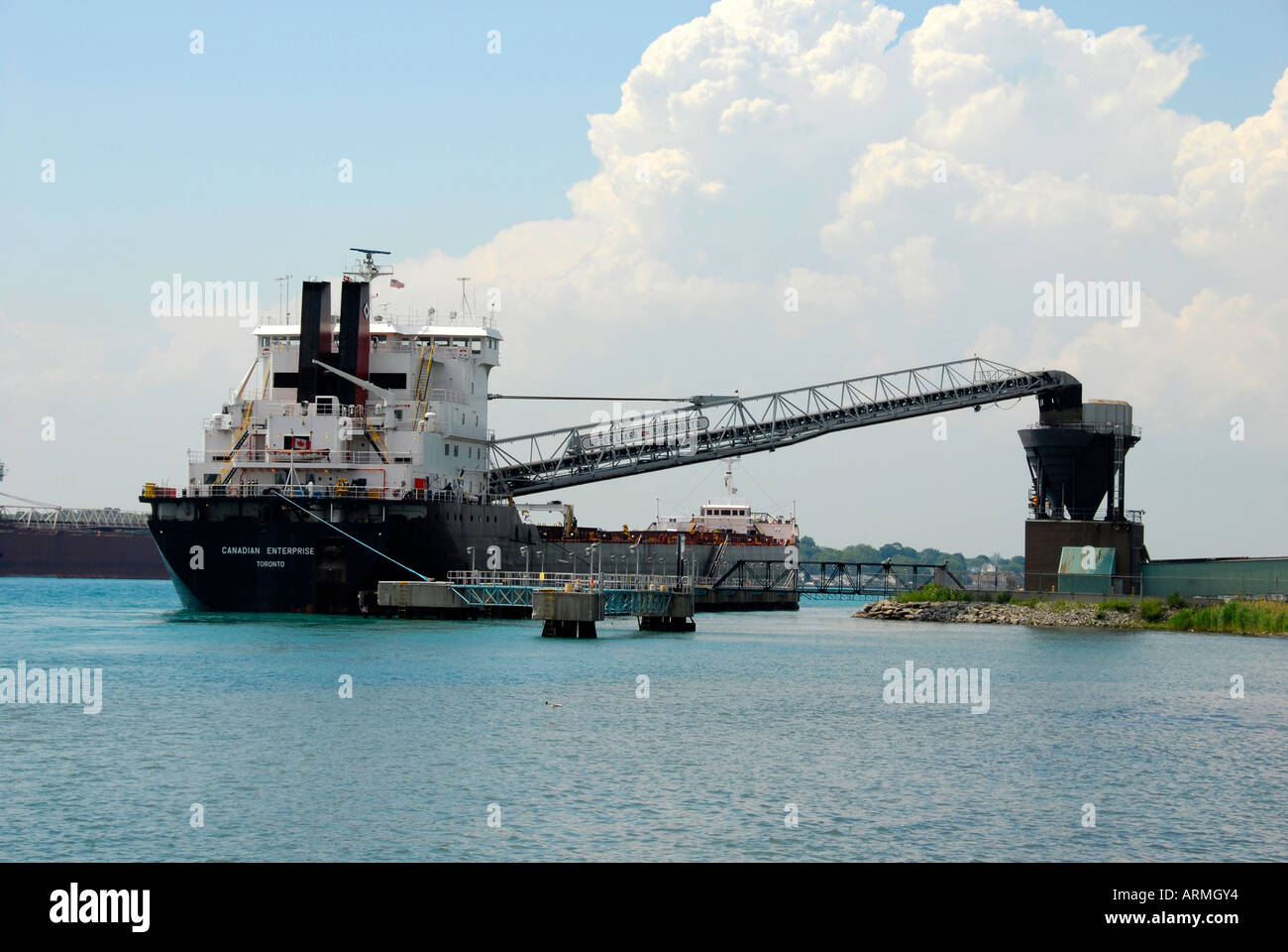 Lake freighter off loads aggregate stone at Port Huron Michigan Stock ...