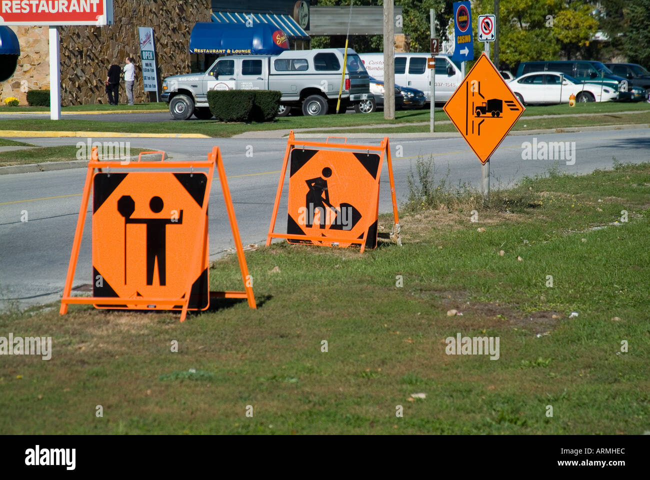 Traffic signs warning motorist that they are entering a road ...