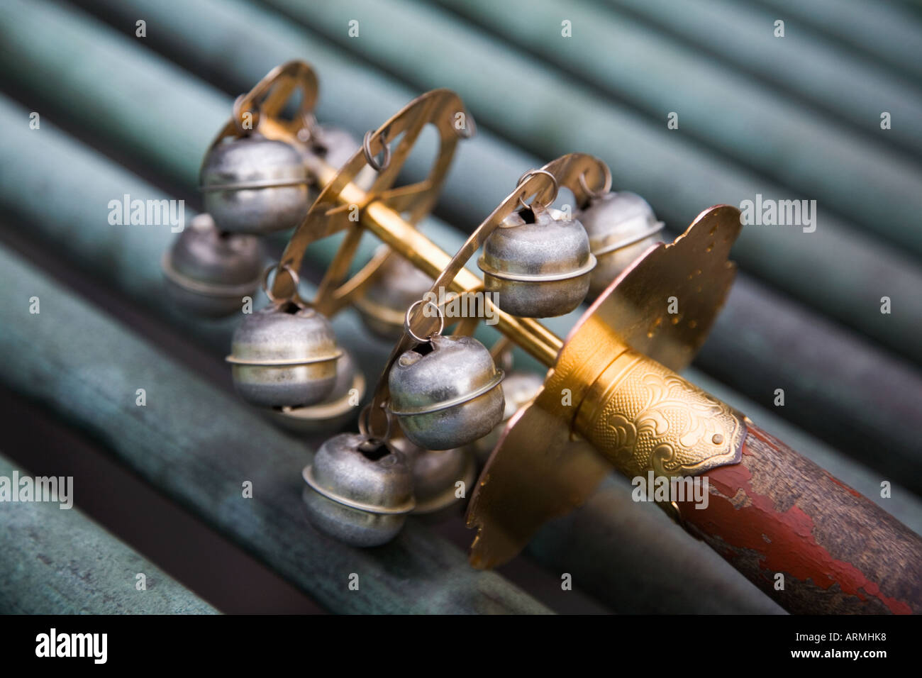 Traditional ceremonial bells sit at a temple in Japan Stock Photo - Alamy