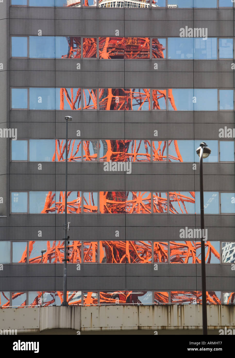 Tokyo tower reflected in a building's windows Stock Photo - Alamy