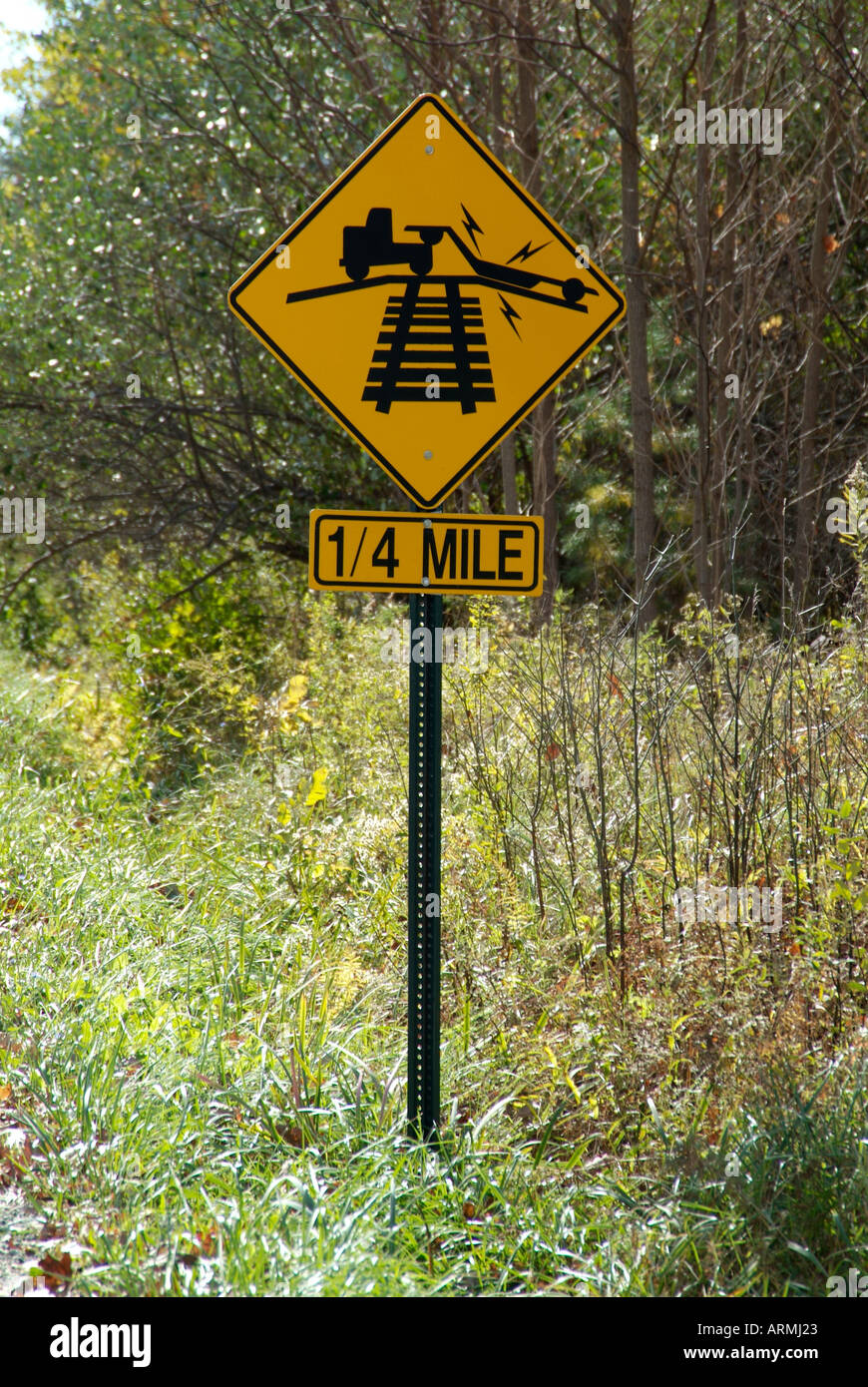 Traffic sign alerting motorist drivers of a high spot on railroad ...