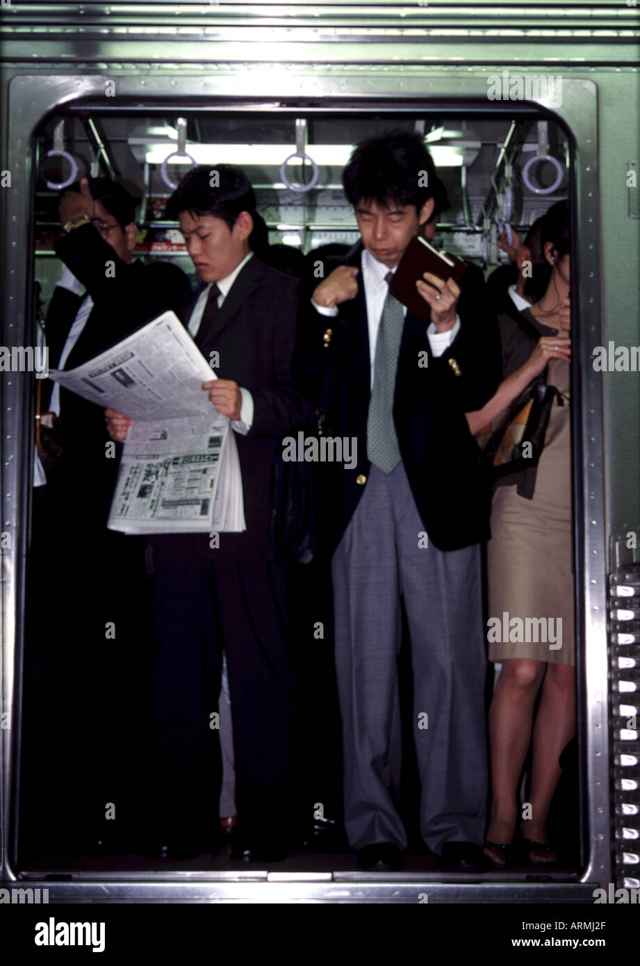Tokyo subway rush hour door hi-res stock photography and images - Alamy