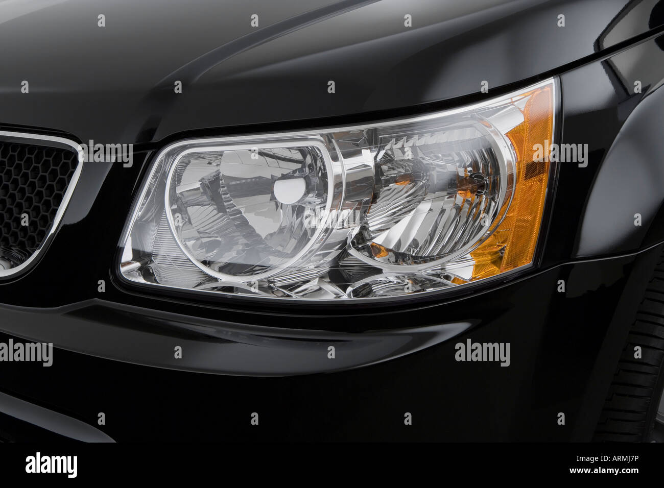 2008 Pontiac Torrent GXP in Black - Headlight Stock Photo - Alamy