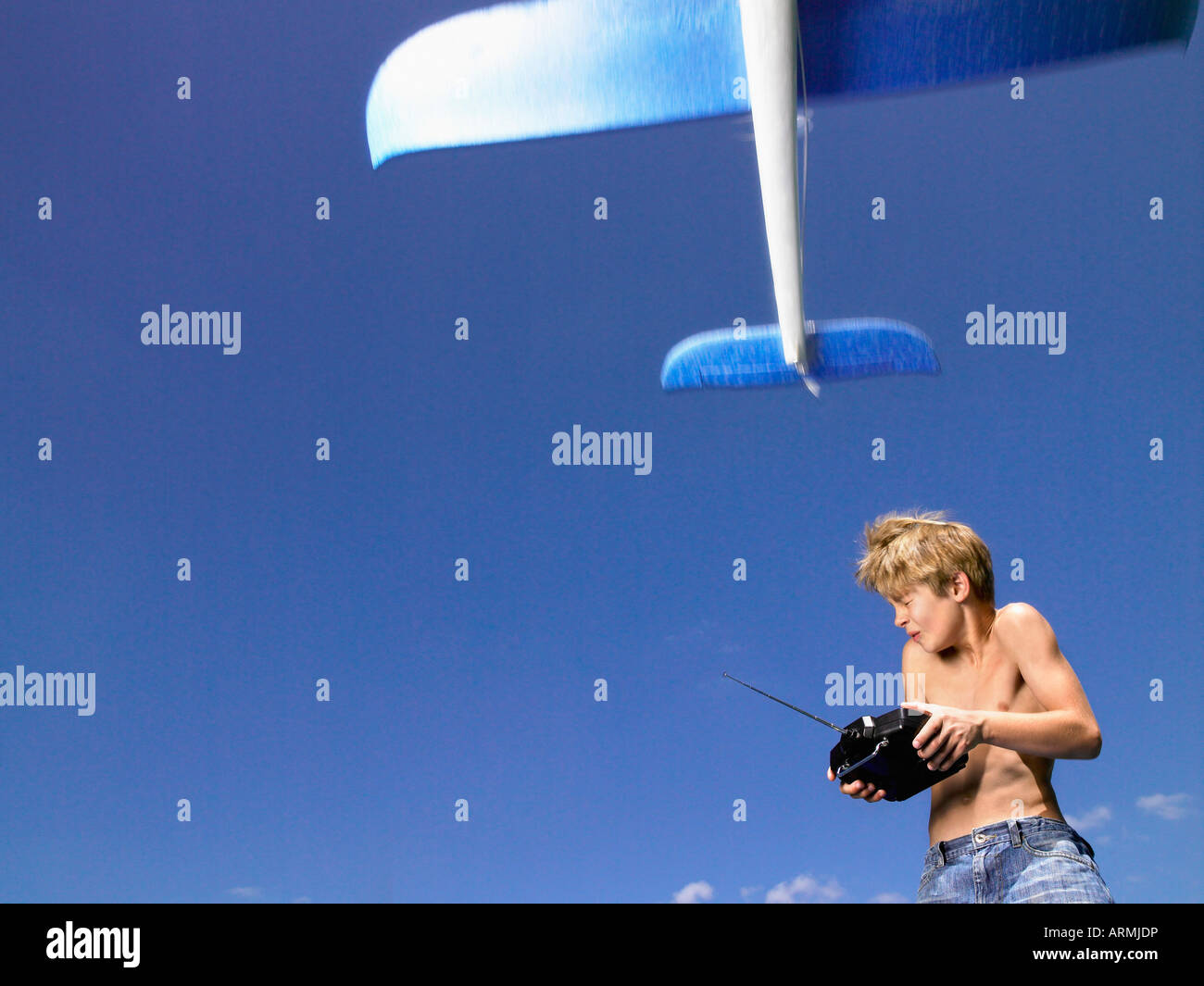 Young boy with remote-control Stock Photo - Alamy
