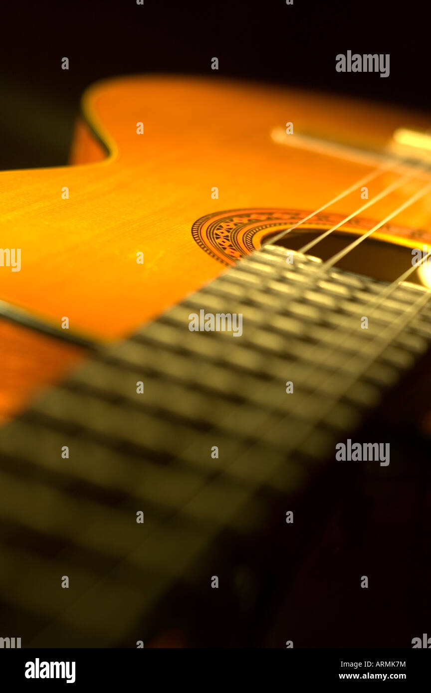 Creative photograph of a guitar with 1 missing string Stock Photo - Alamy