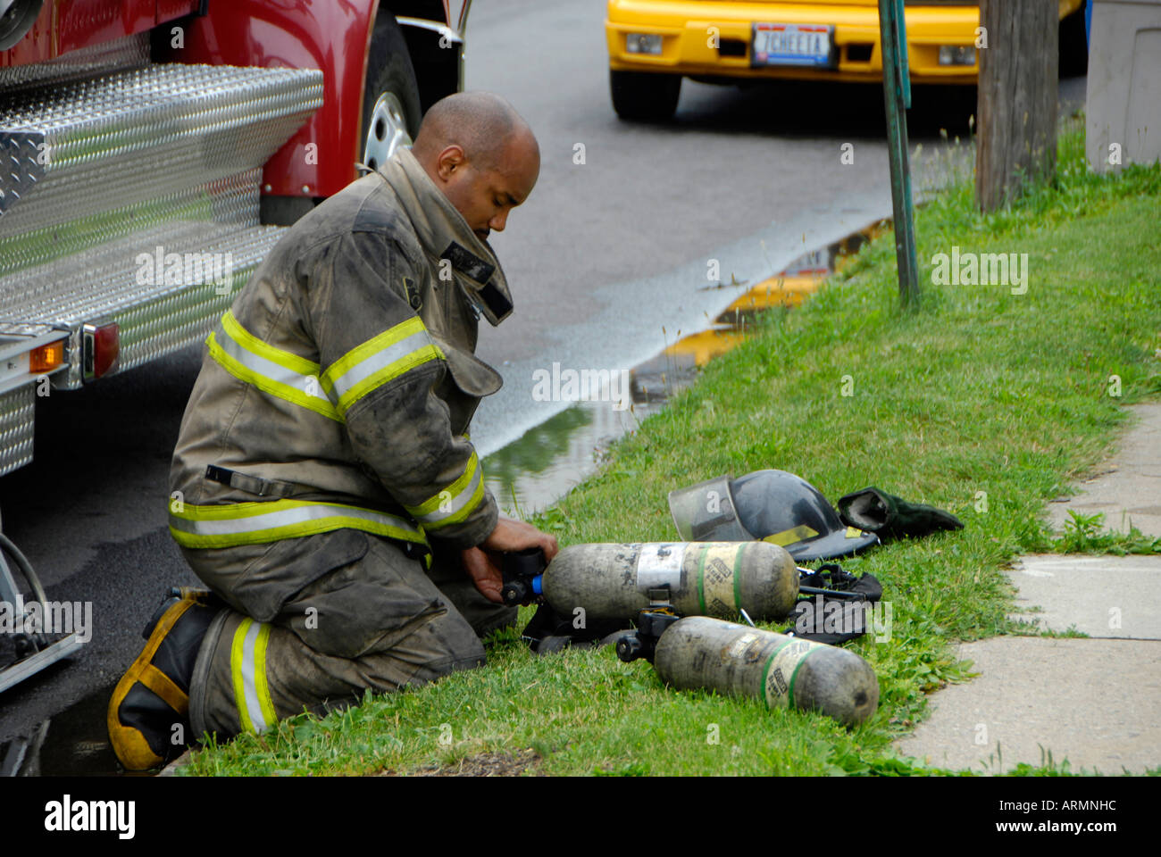 Portrait of a fireman as he responds to an emergency fire situation ...