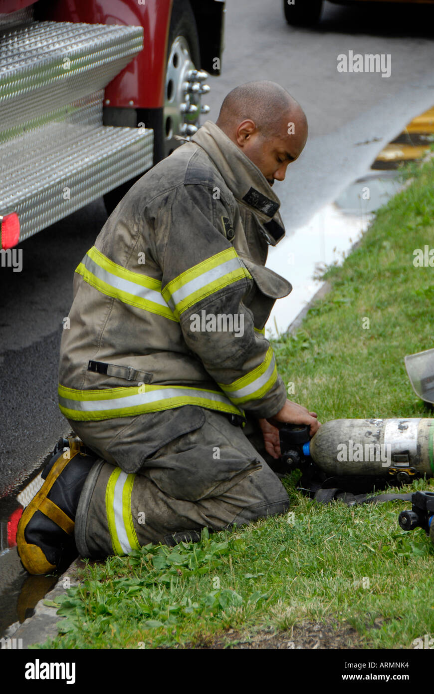 Portrait of a fireman as he responds to an emergency fire situation ...