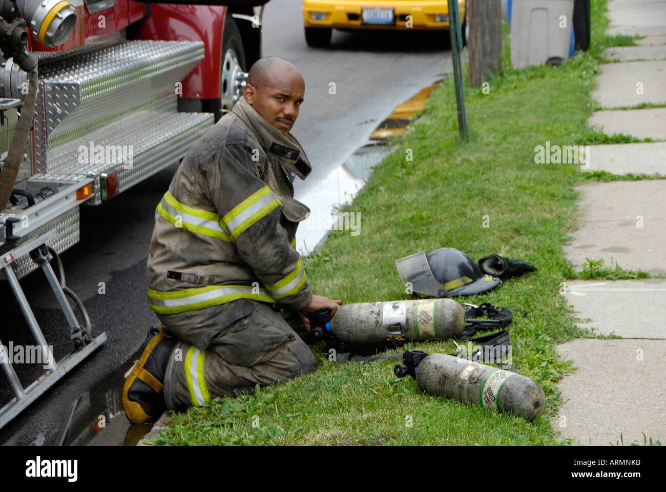 Portrait of a fireman as he responds to an emergency fire situation ...
