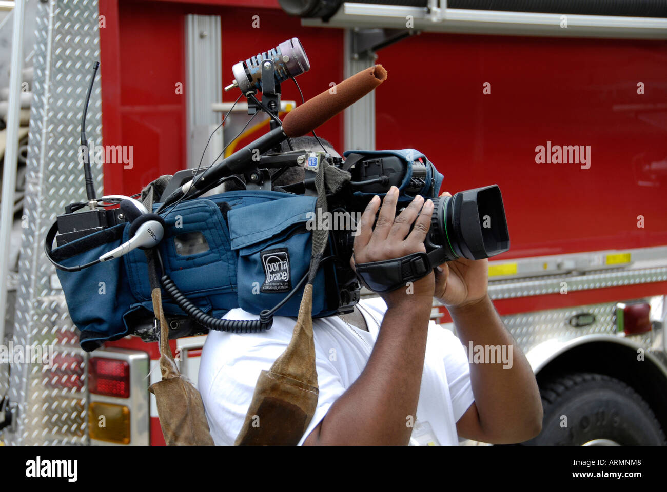 Television cameraman records a TV interview Stock Photo - Alamy