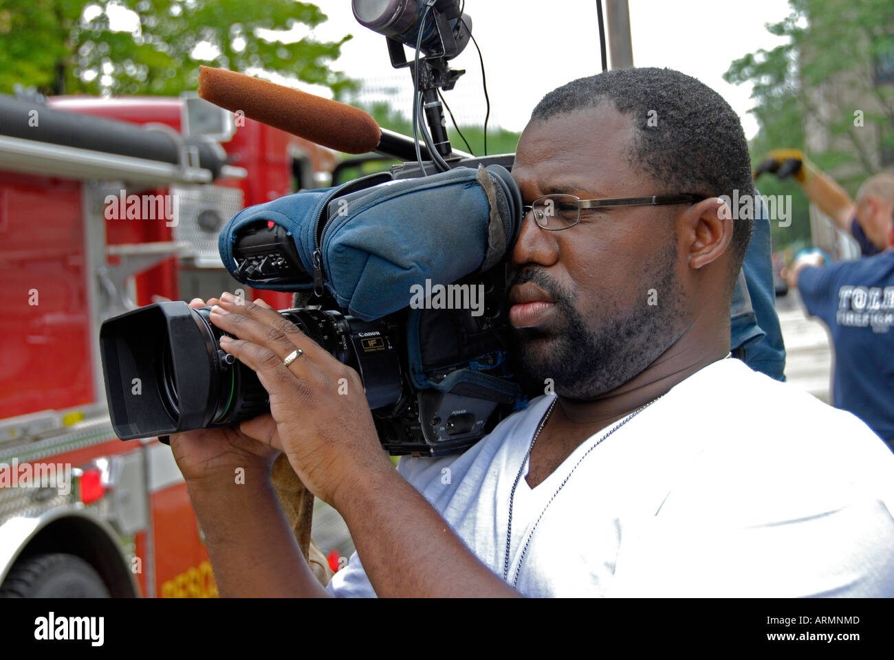 Television cameraman records a TV interview Stock Photo - Alamy