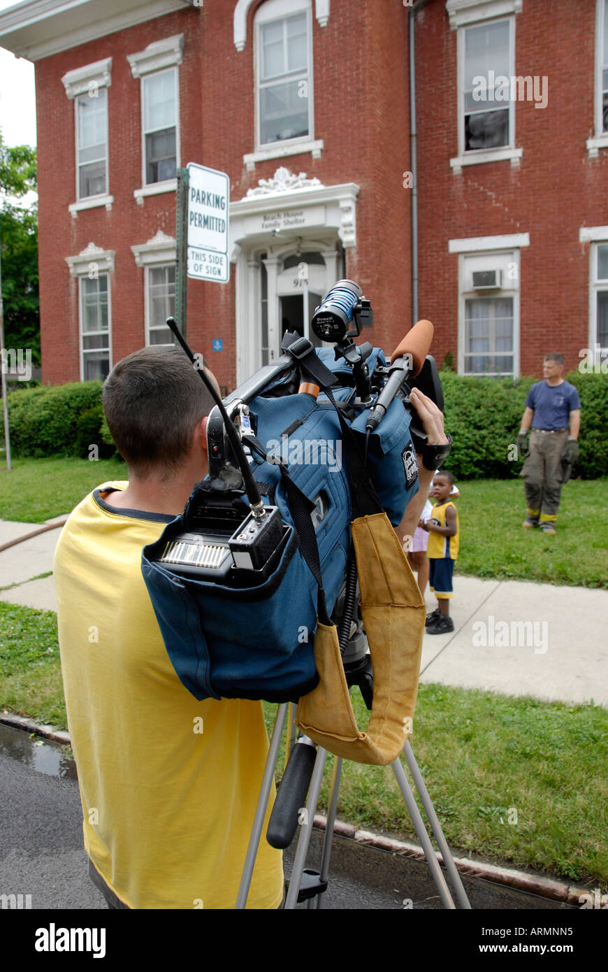 Television cameraman records a TV interview Stock Photo - Alamy