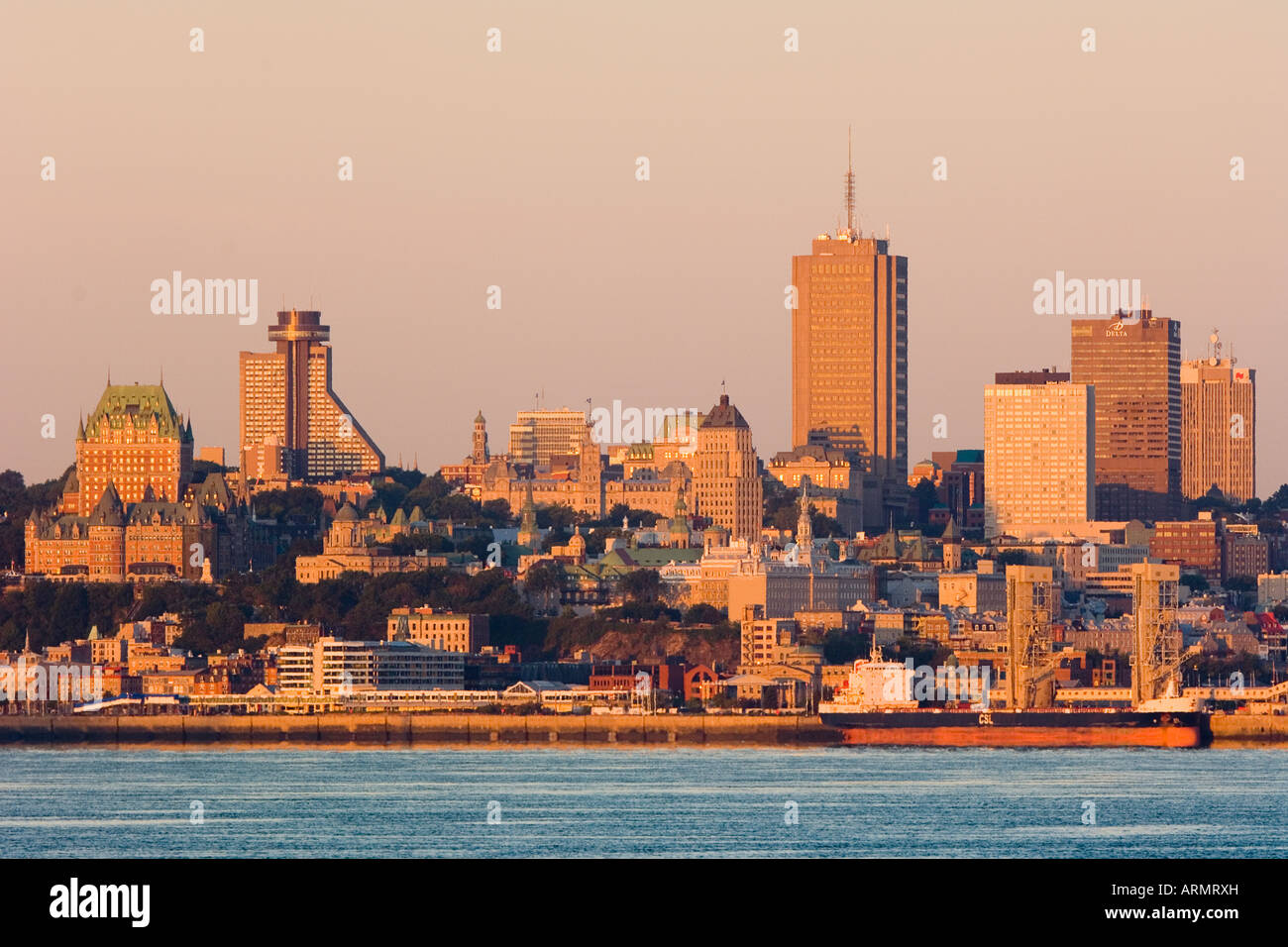 Sunrise view of Quebec City from across St. Lawrence River from Island ...