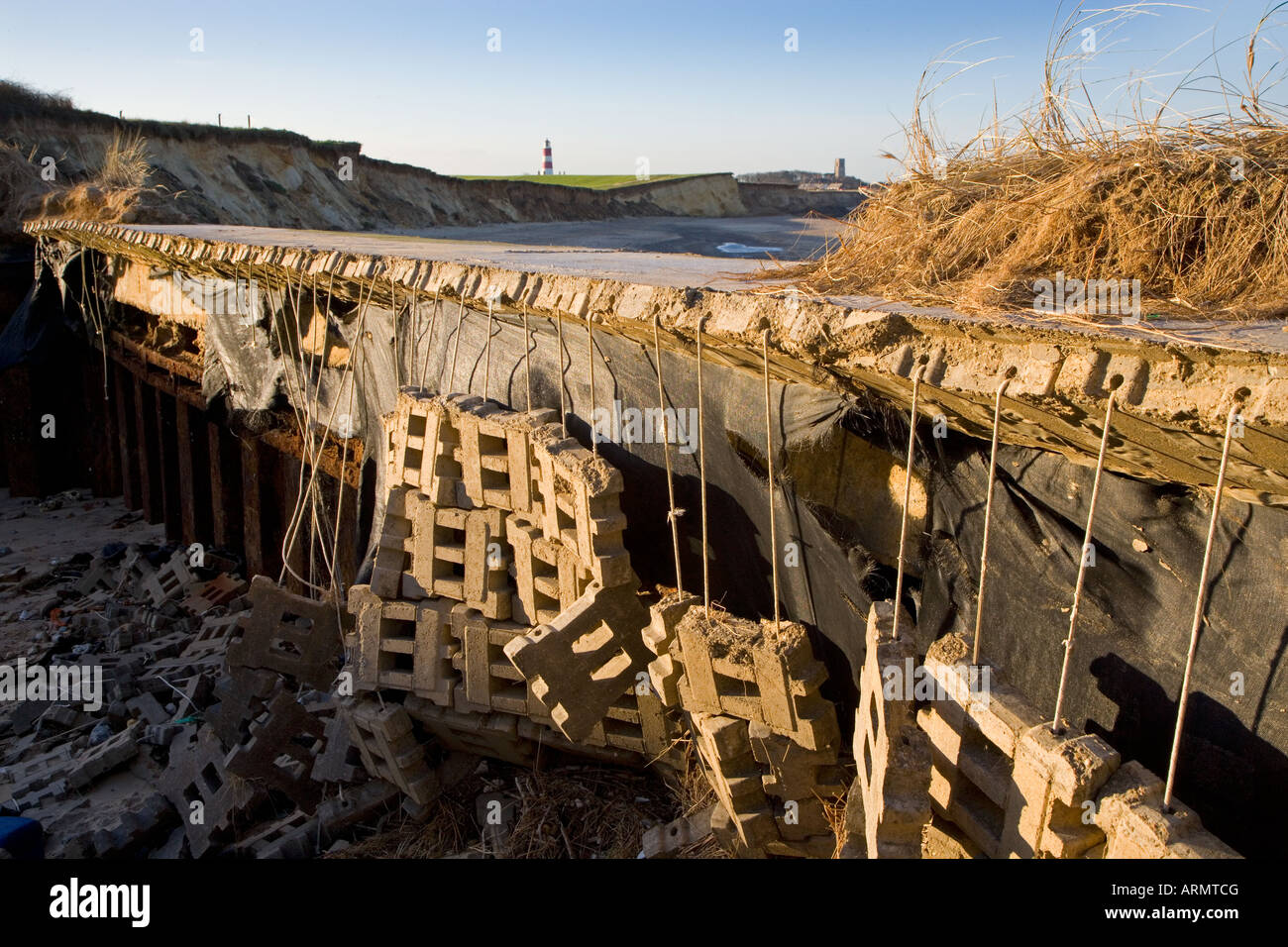 Broken Sea Wall Happisburgh Norfolk UK Winter Stock Photo - Alamy