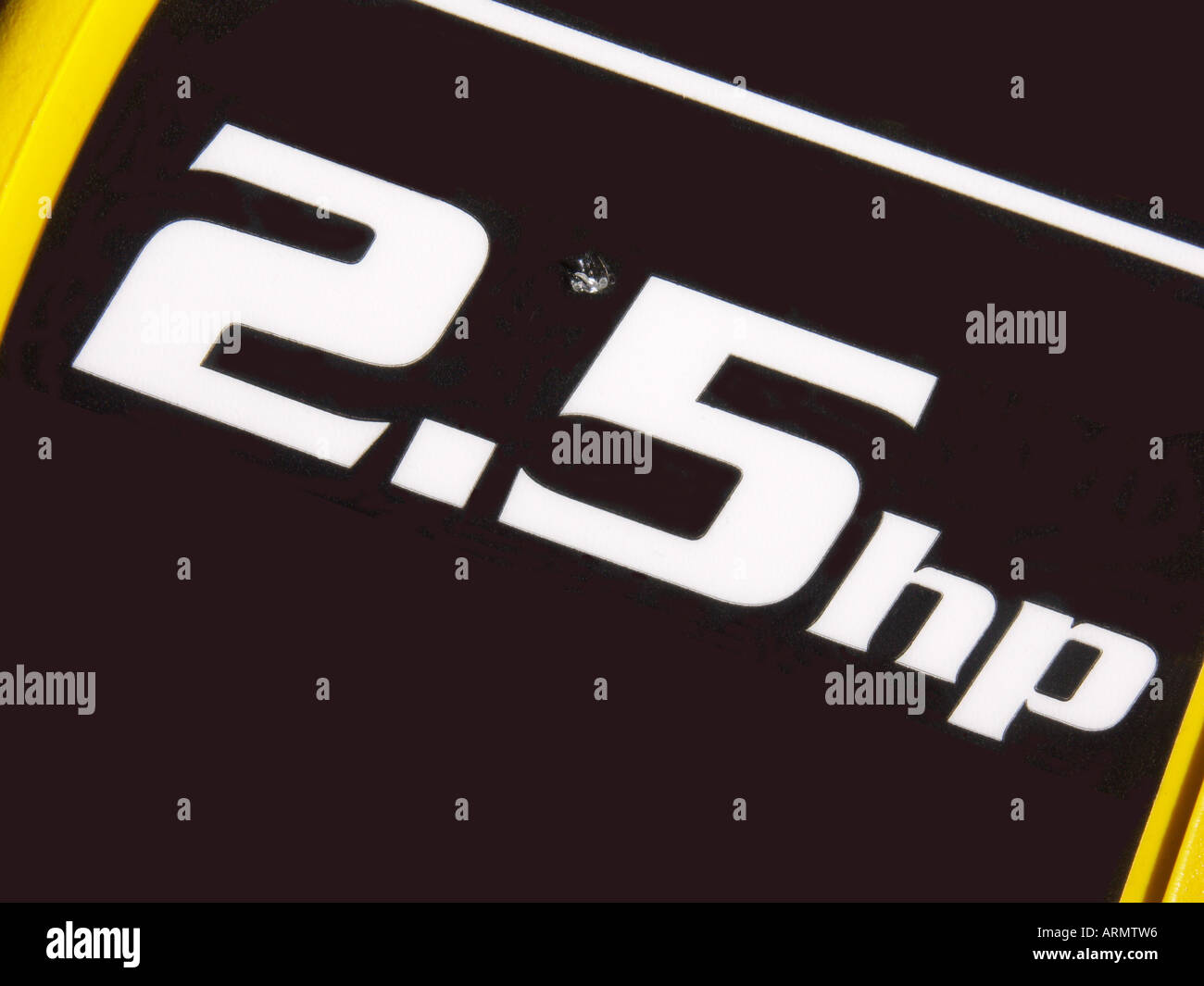 2.5 horsepower sign on a chainsaw motor Stock Photo - Alamy