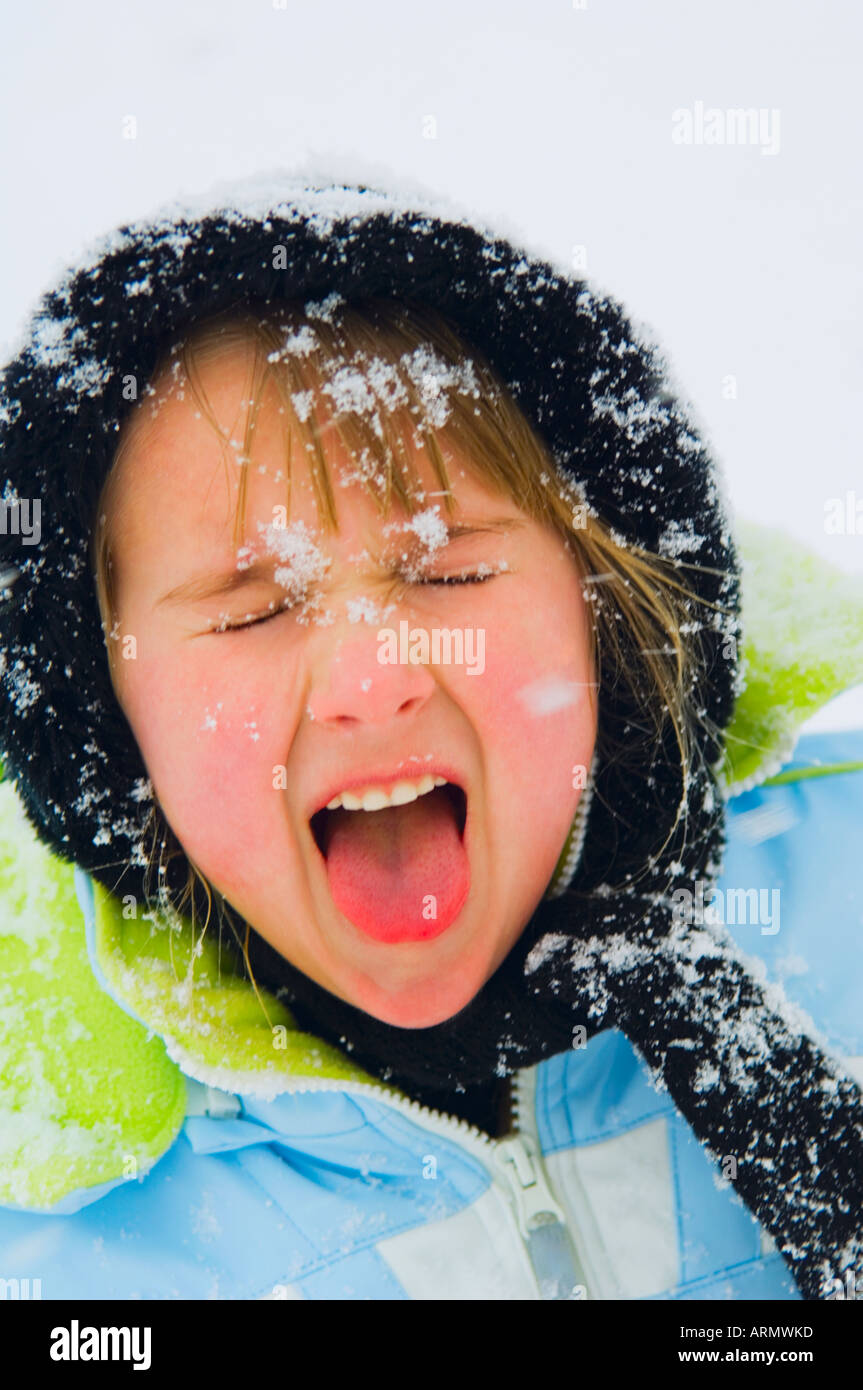 Girl catching snowflakes tongue hi-res stock photography and images - Alamy