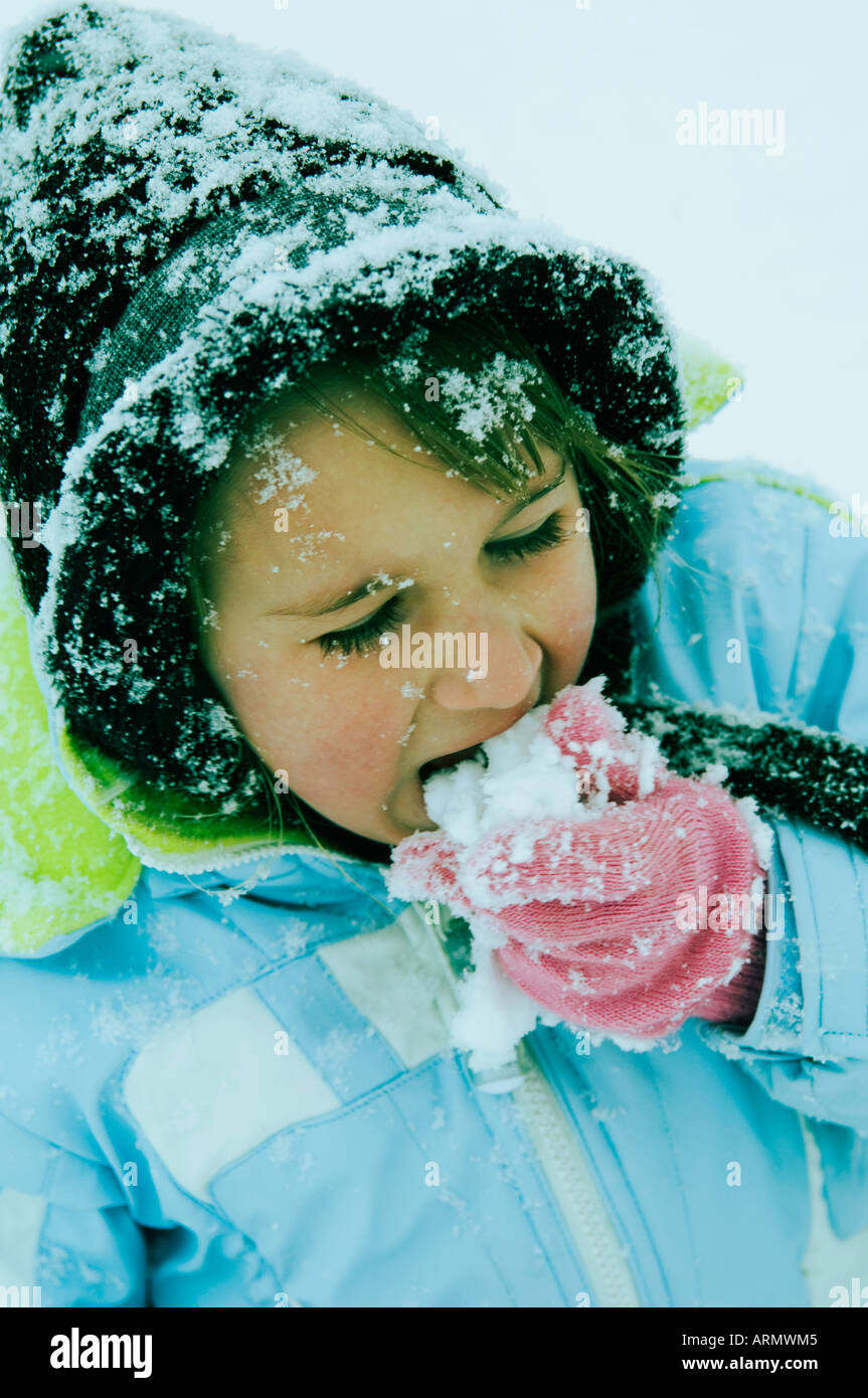 Child tasting the snow hi-res stock photography and images - Alamy