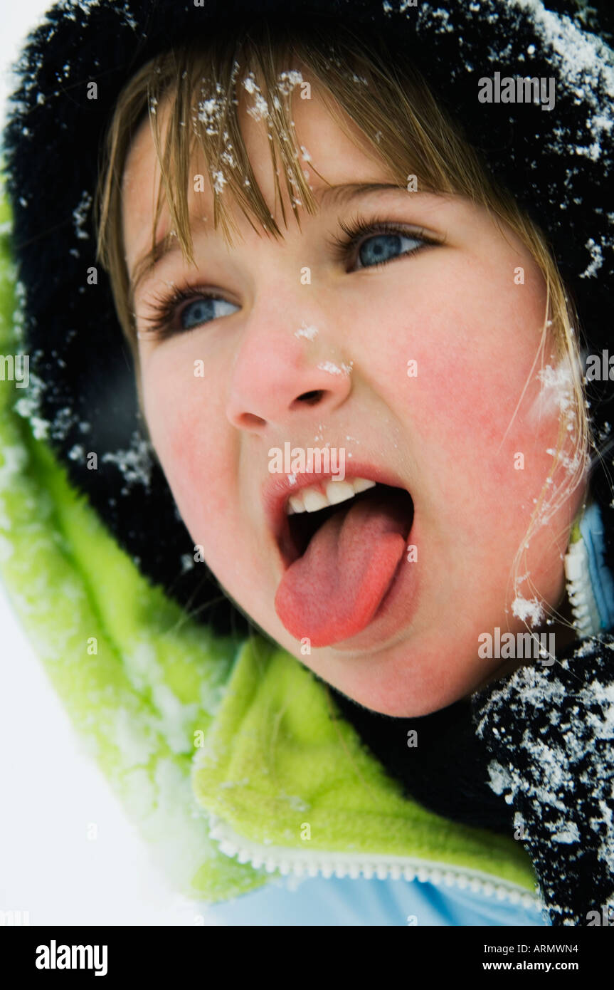 Girl catching snowflakes tongue hi-res stock photography and images - Alamy
