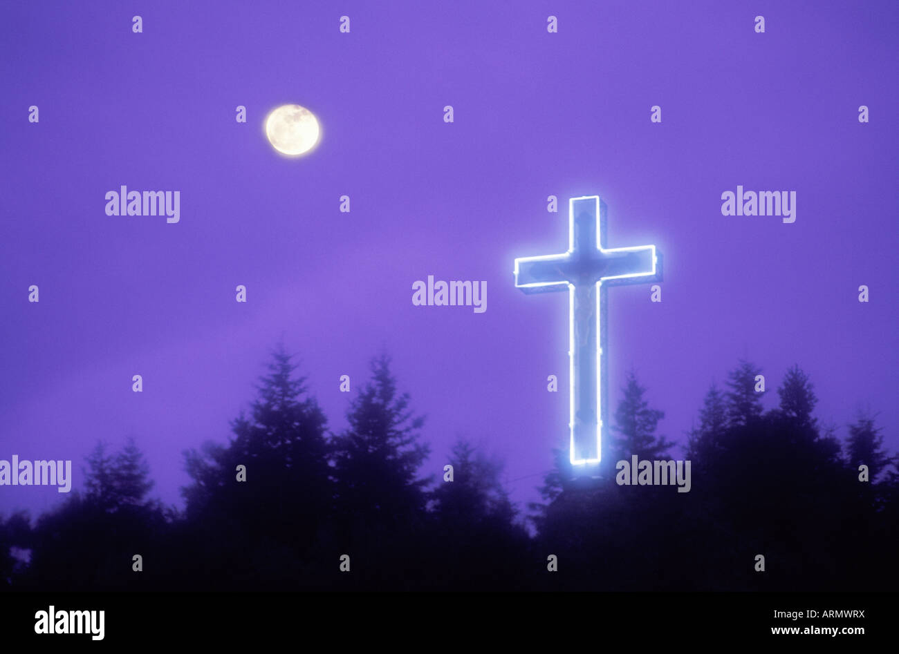 Hillside with illuminated cross, Gaspe Peninsula, Quebec, Canada Stock ...