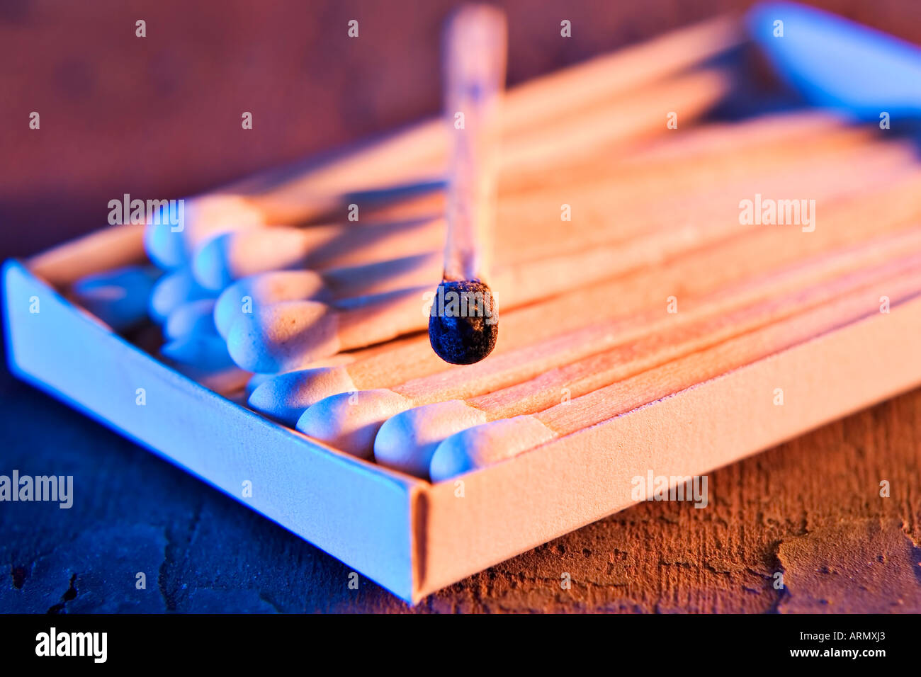 Burnt match and matchbox Stock Photo - Alamy