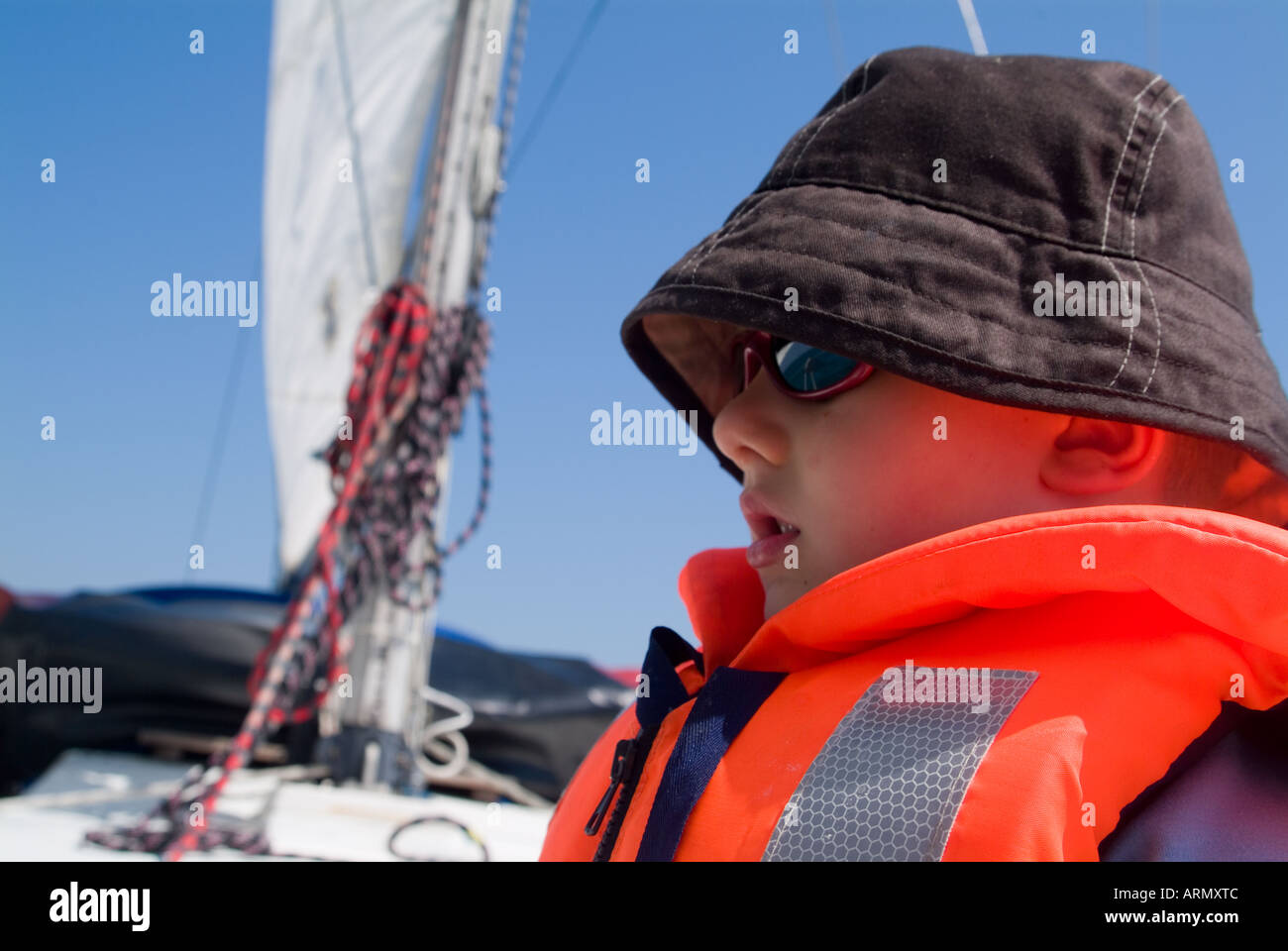 Boy wearing lifejacket hi-res stock photography and images - Alamy