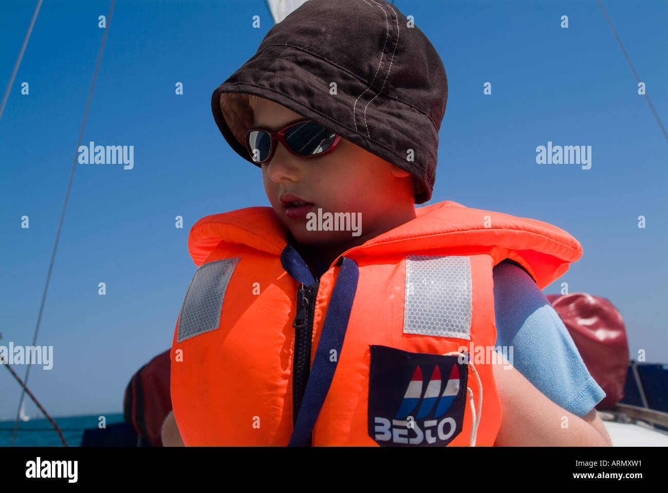 Boy wearing lifejacket hi-res stock photography and images - Alamy