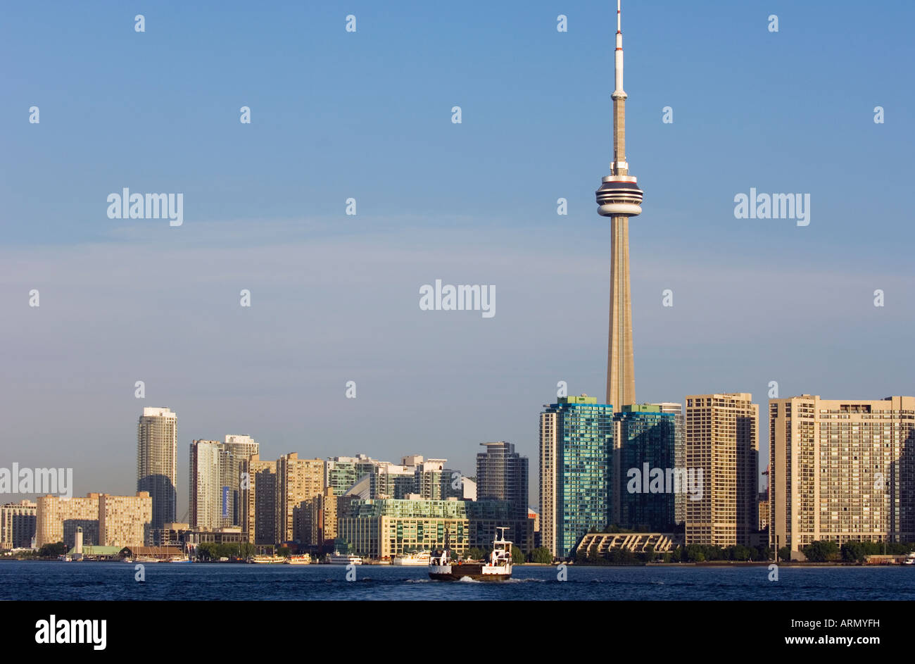 Skyline view and Ferry from across Lake Ontario from Toronto Islands of ...