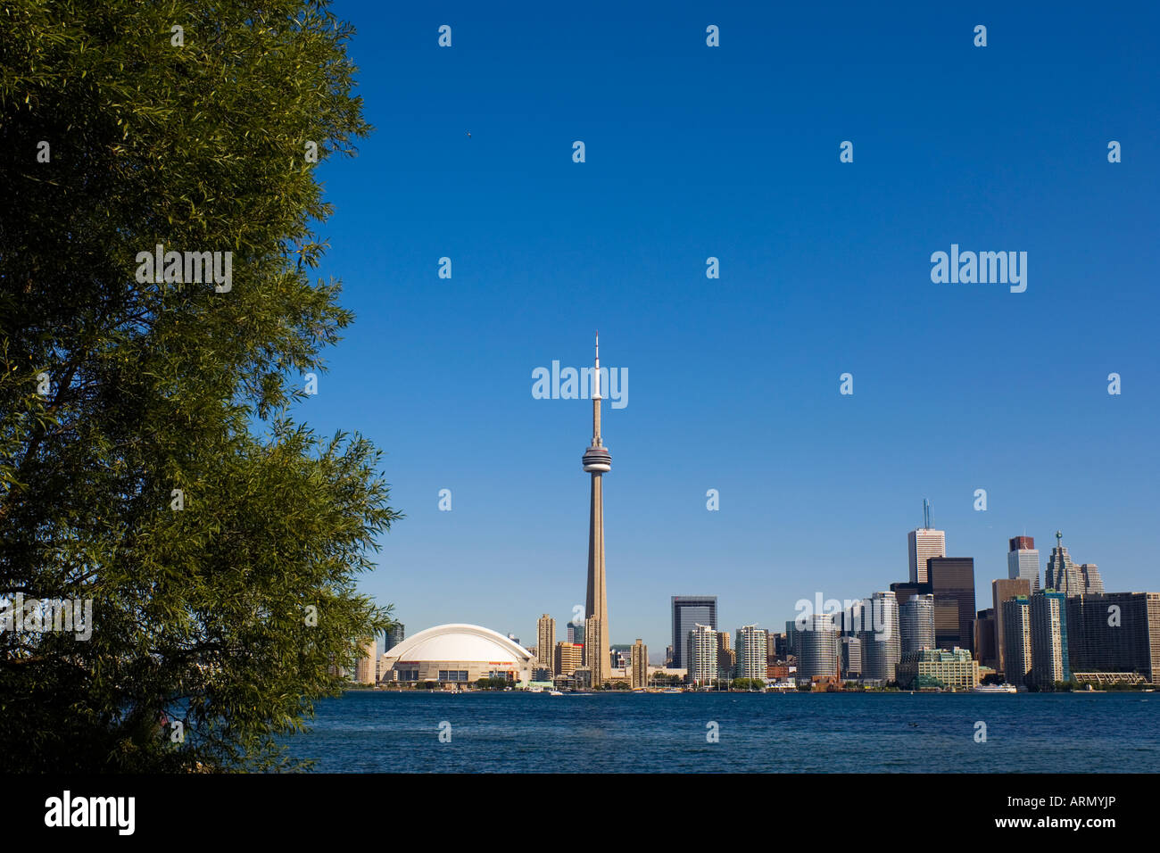 Skyline view and Ferry from across Lake Ontario from Toronto Islands of ...