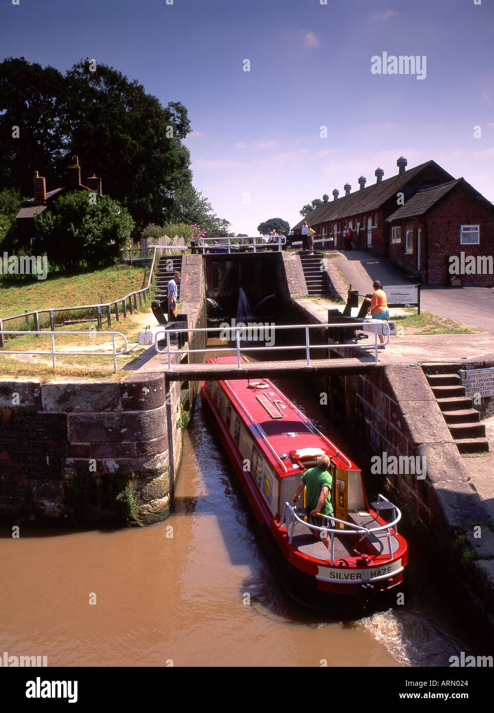 Canal boat Silver Haze Transitting Bunbury Staircase Locks Shropshire ...
