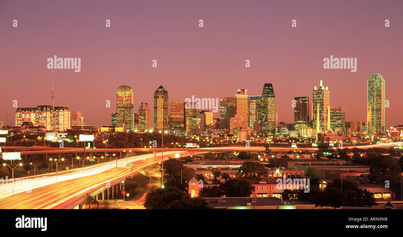 Dallas skyline at sunset with traffic over elevated highways Stock ...