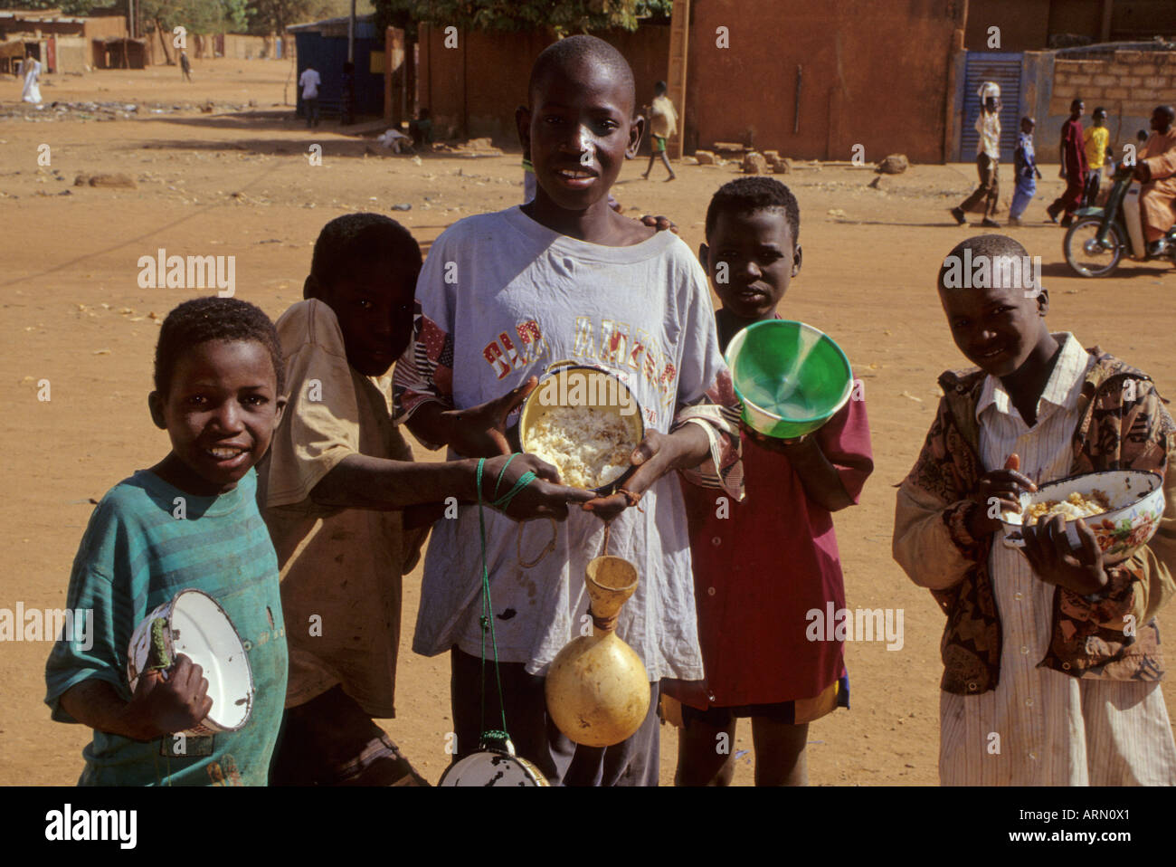 Niamey, Niger, Africa. Nigerien Boys with Begging Bowls On the Muslim ...