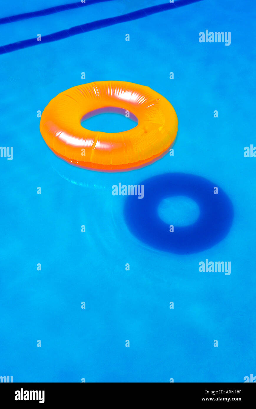 inner tube floating in pool Stock Photo - Alamy