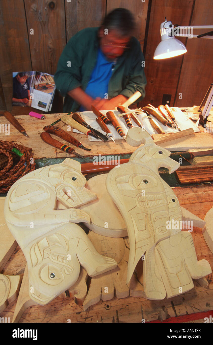Salish artist carves yellow cedar decor, Duncan, British Columbia ...