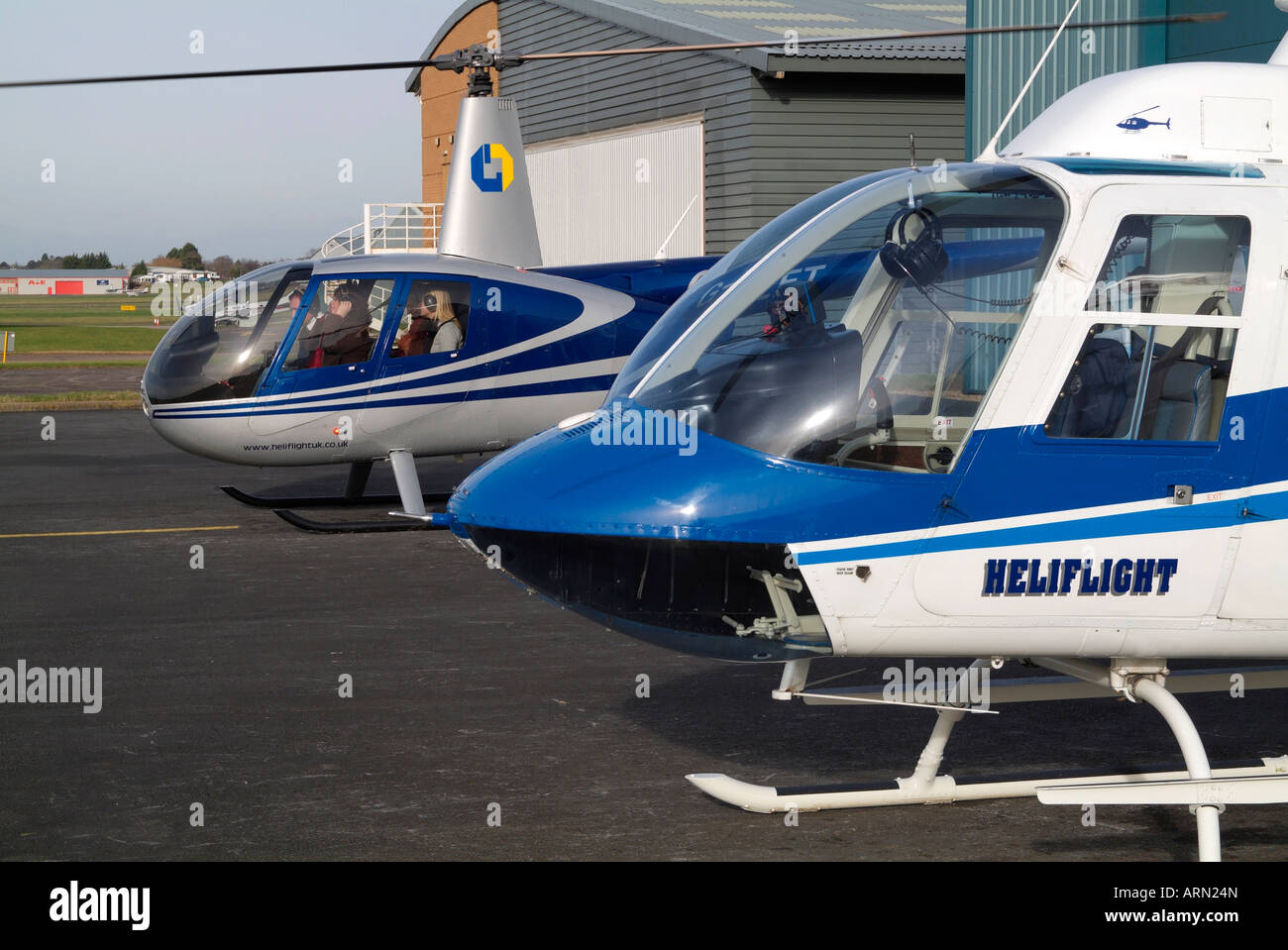 ROBINSON R44 AND JETRANGER 2 HELICOPTERS. GLOUCESTER AIRPORT. ENGLAND ...