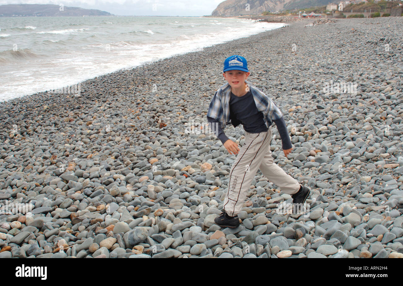 Boy throwing stones hi-res stock photography and images - Alamy