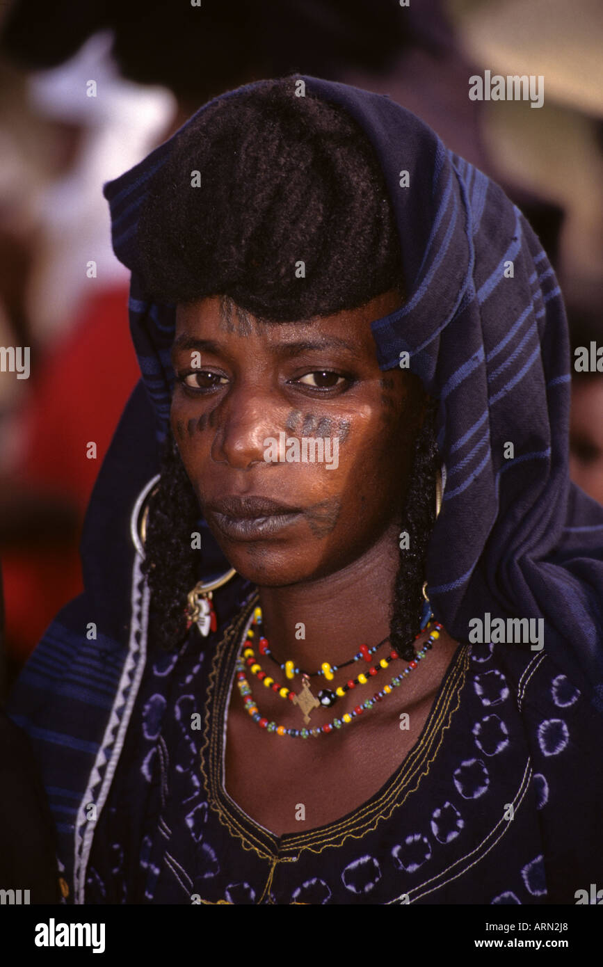 Akadaney, Niger, Africa. Fulani Wodaabe Woman at Geerewol watching Male ...