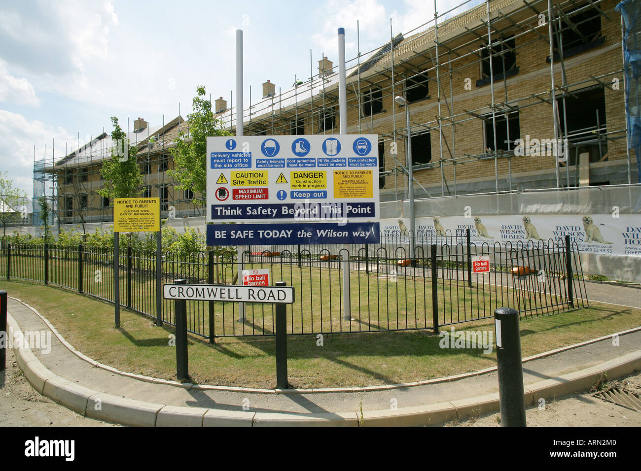 Warning sign at the entrance of a housing estate building site, Great ...