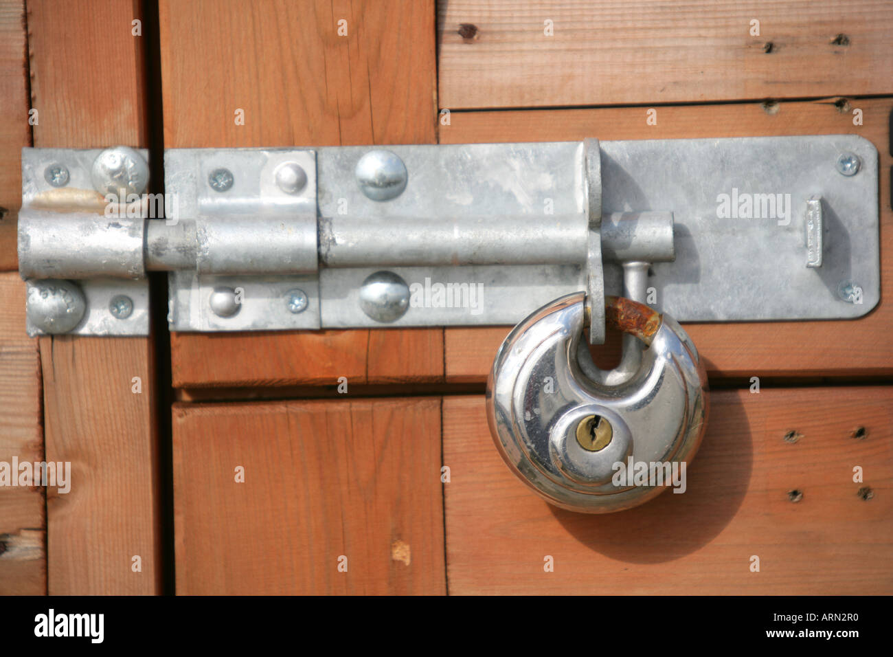 Lock on beach hut door hi-res stock photography and images - Alamy