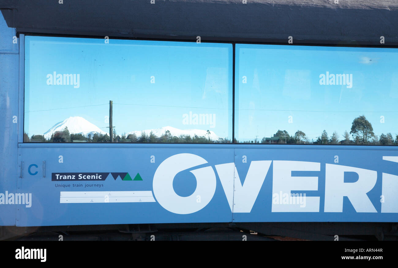 Tranzscenic overlander train at national park with mount Ruapehu in ...