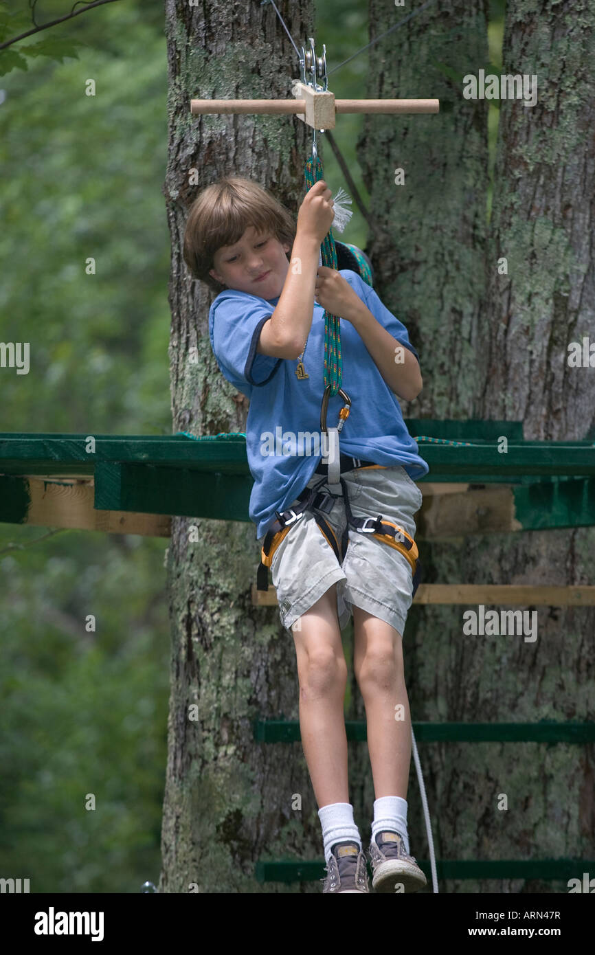 11 year old boy on the zip line Stock Photo - Alamy