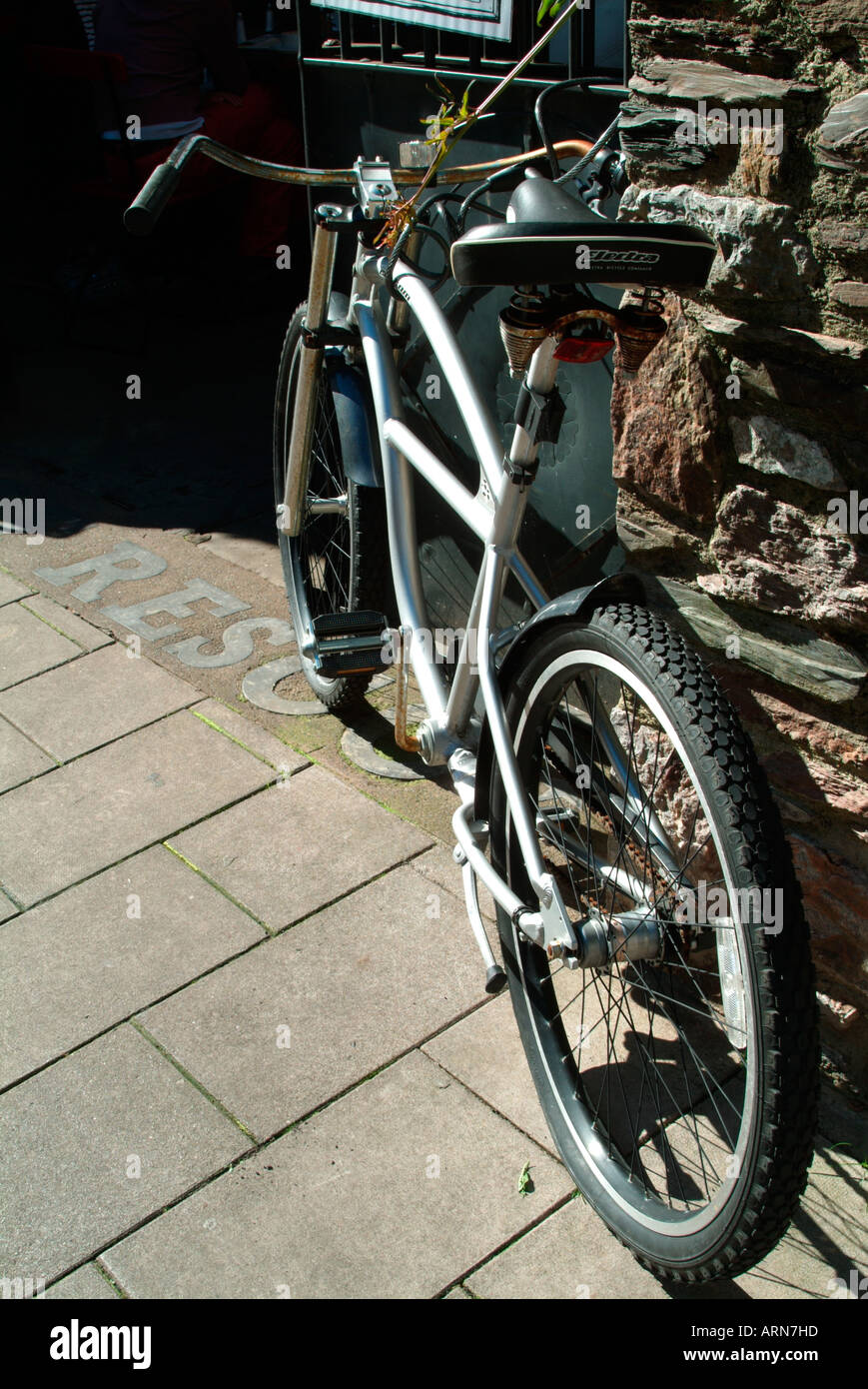 Chunky bike parked outside a cafe in Dartmouth Devon England UK Stock ...