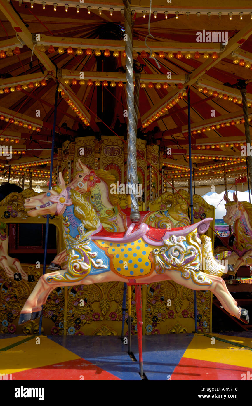 Wooden horse on traditional merry go round Stock Photo - Alamy
