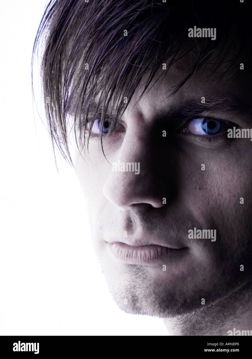 Portrait of a young man with unusual eyes Stock Photo - Alamy