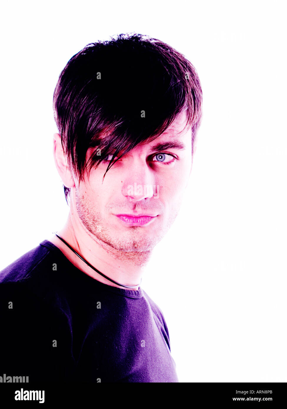 Portrait of a serious young man Stock Photo - Alamy