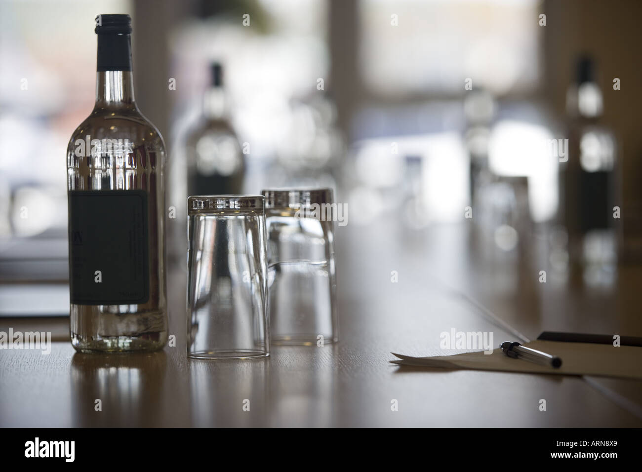 Water bottle and glasses set up for a meeting Stock Photo - Alamy
